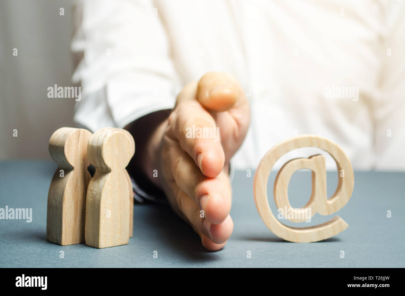 A man's hand separates people from the Internet. The concept of ...