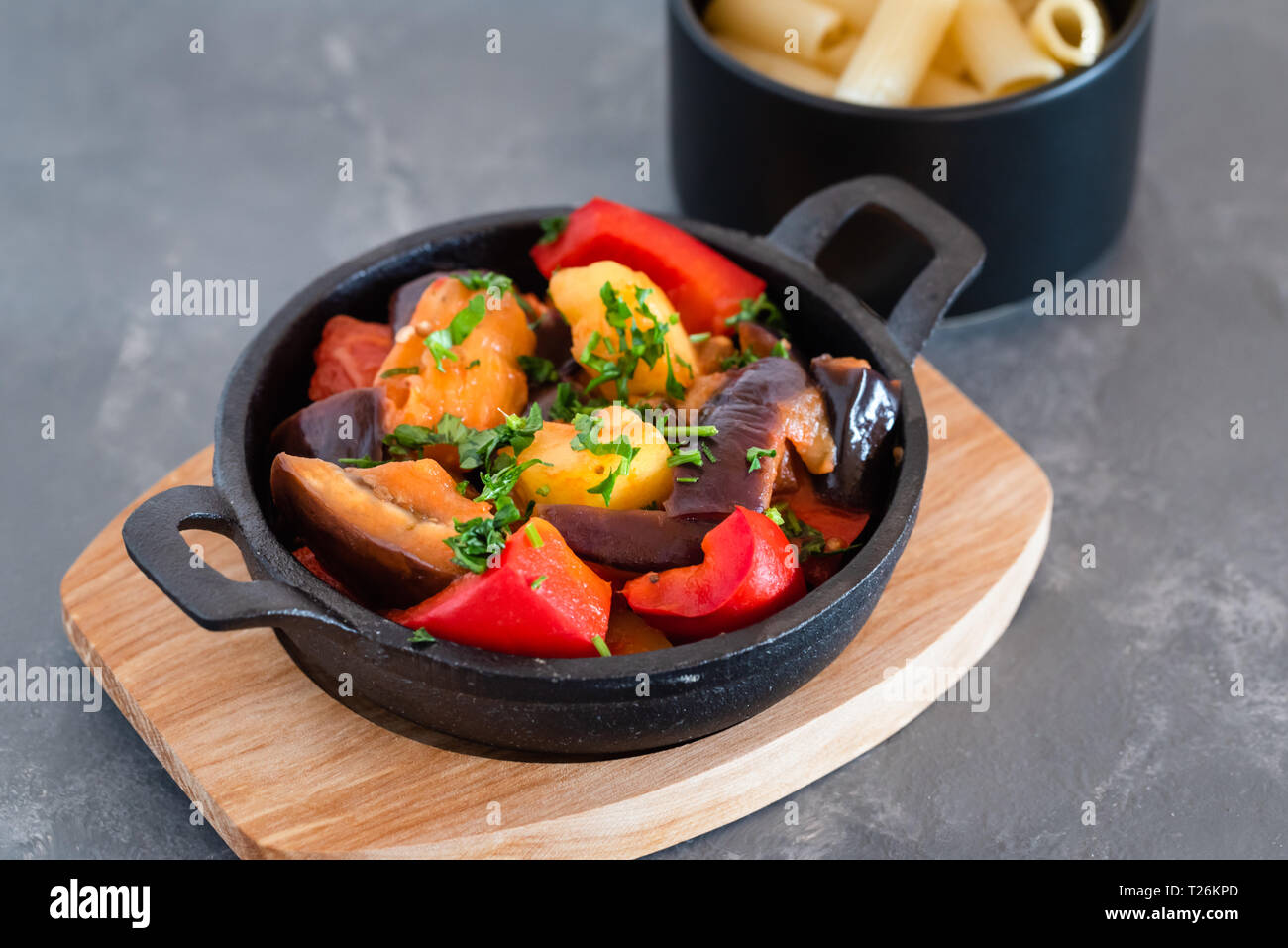 Vegetarian letcho with baked aubergine, zucchini, pepper in tomato ...