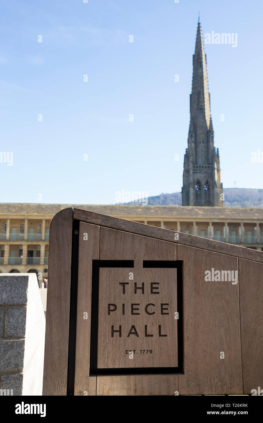 The Piece Hall logo in the timber part of a public bench in the Central ...