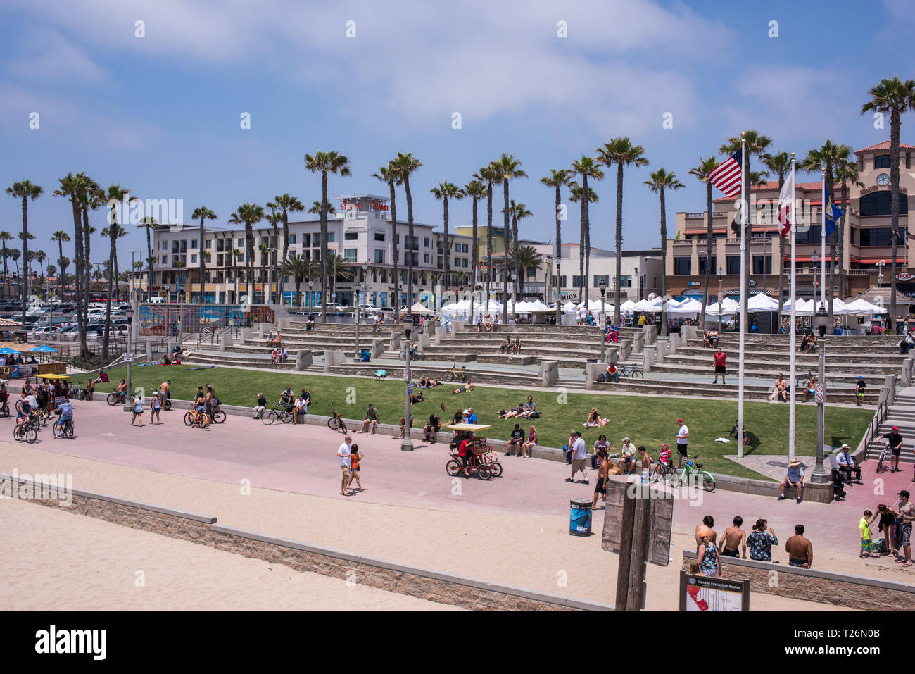 A sunny summer day on Huntington Beach brings a variety of people out ...