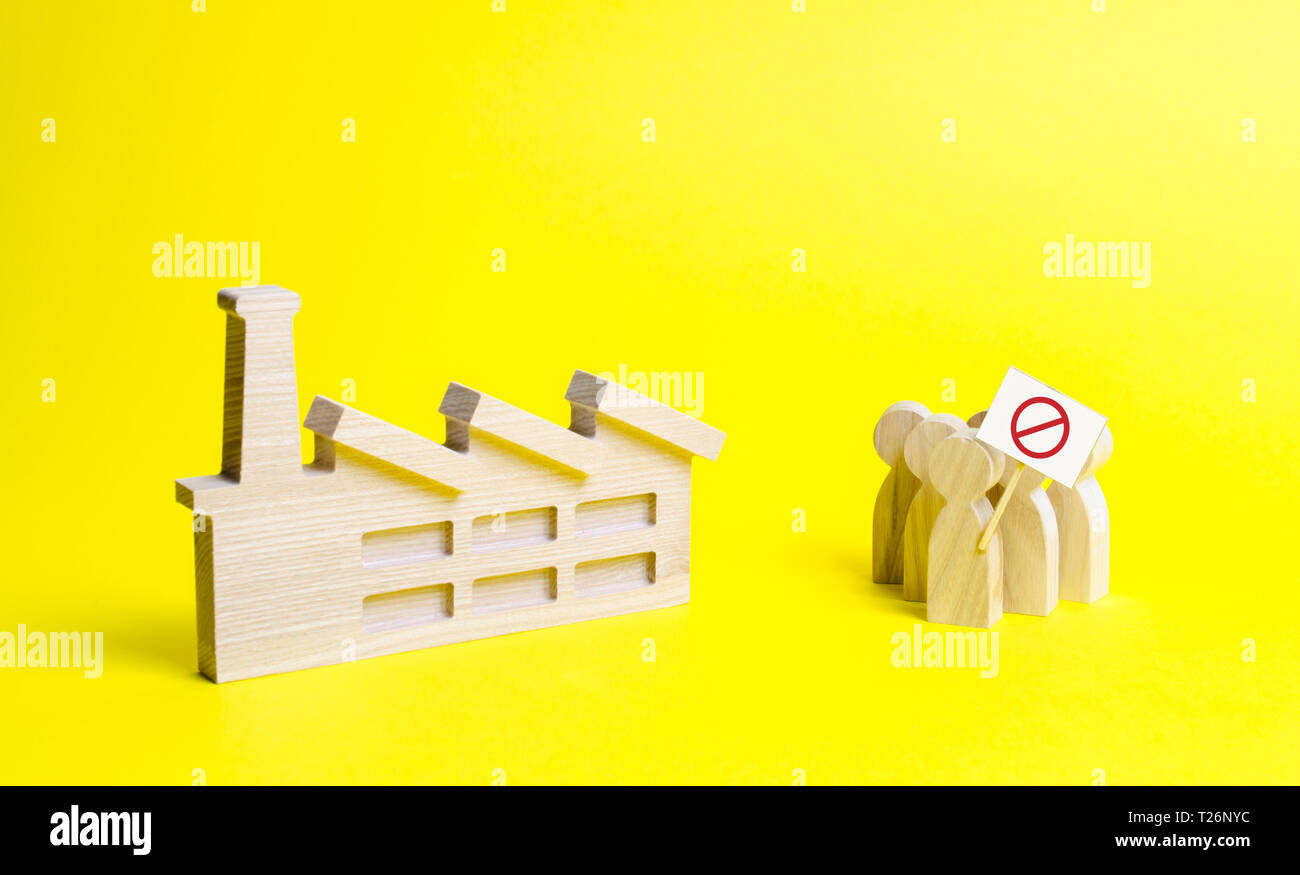 An angry crowd of figures of people with a poster on an yellow ...