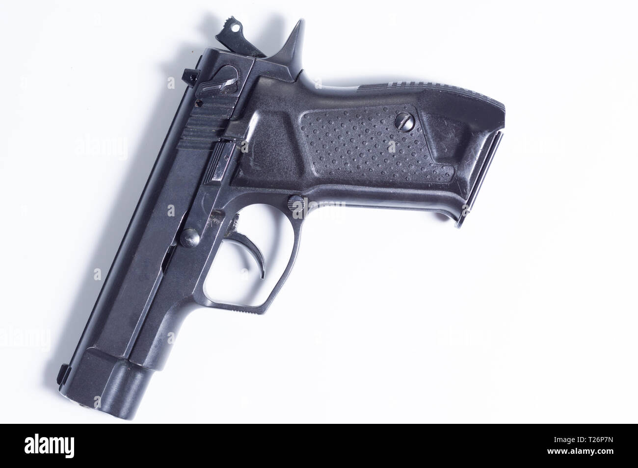 A firearm on a white background. Isolate gun. Flat lay Stock Photo - Alamy