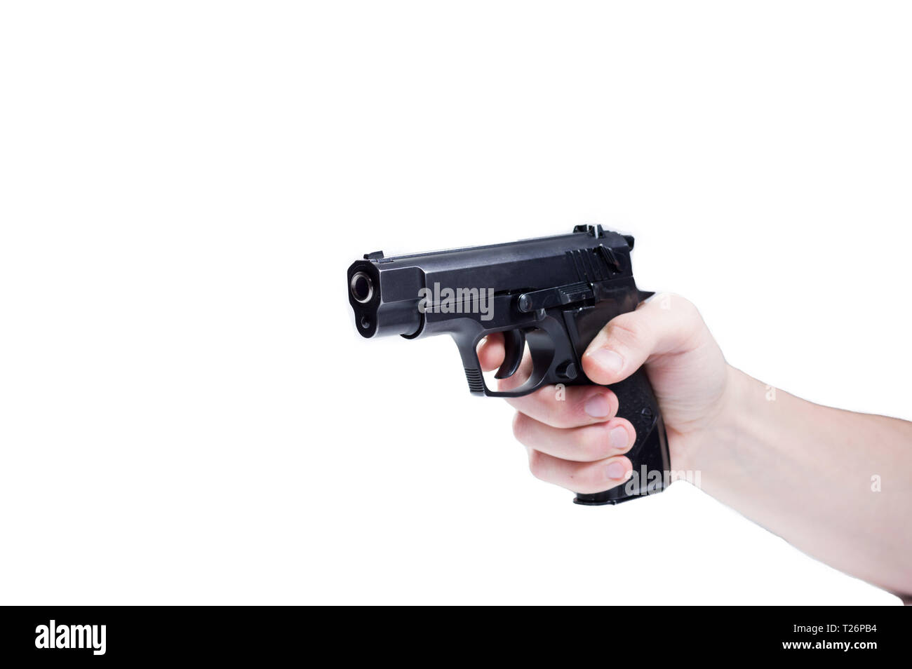 Pistol in hand. Isolate gun in hand. Pointing a gun. White background ...