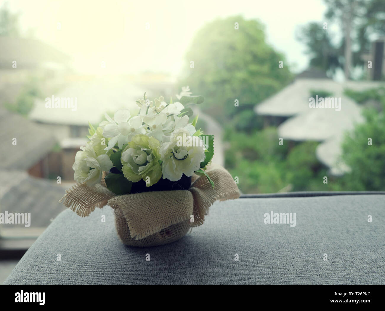 Bouquet decorate flowers in hay basket Stock Photo - Alamy