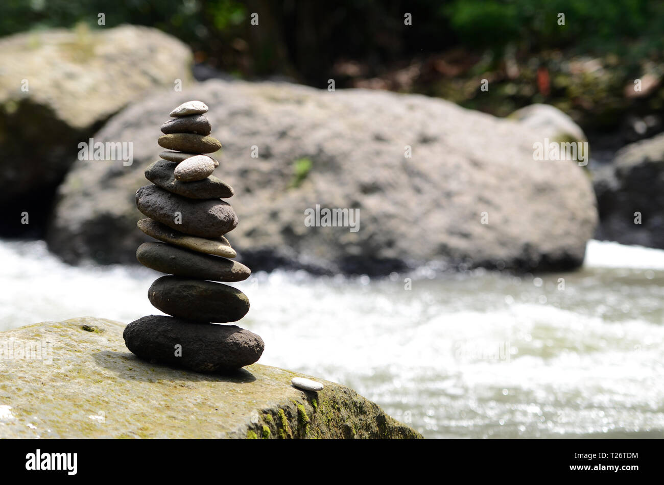 Stacked zen stone at Tegenungan Waterfall in Ubud Bali Indonesia Stock ...