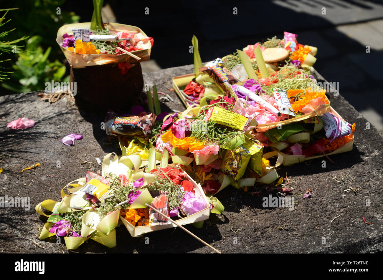 Traditional balinese offerings to gods in Bali with flowers Stock Photo ...