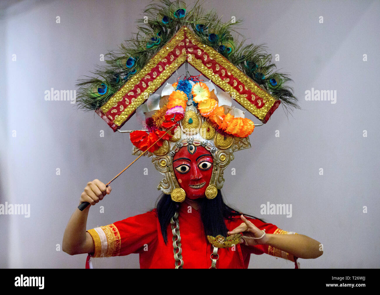 Kathmandu, India, 30th Mar, 2019. A Nepalese mask dancer makes ...