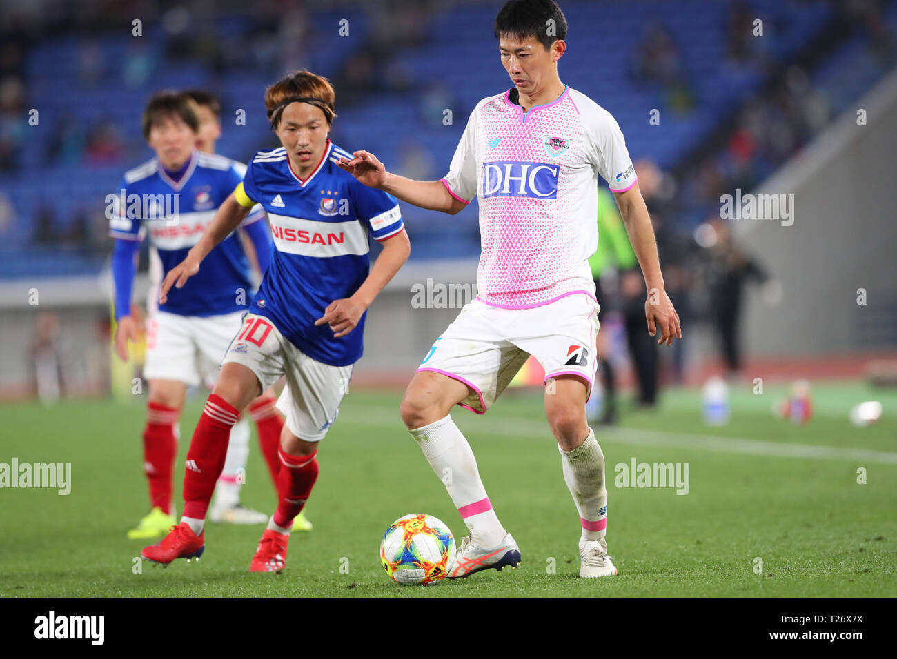 Kanagawa, Japan. 29th Mar, 2019. (L-R) Jun Amano (FMarinos), ?Hideto ...