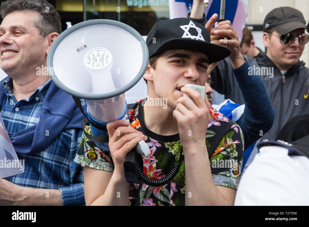 London, UK. 30th March, 2019. A man with a Star of David cap attends a ...