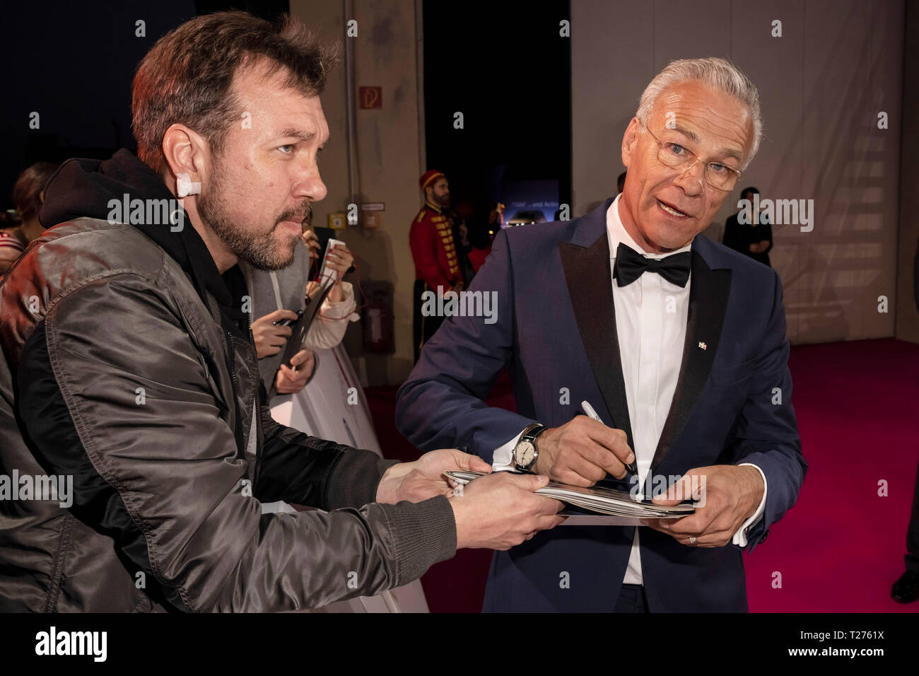 Berlin, Germany. 30th Mar, 2019. Klaus Behrendt, actor, signs ...