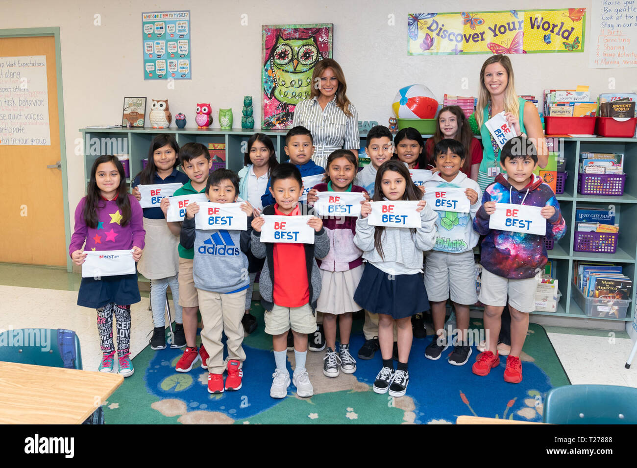 First Lady Melania Trump poses for a photo with students in a 2nd grade ...