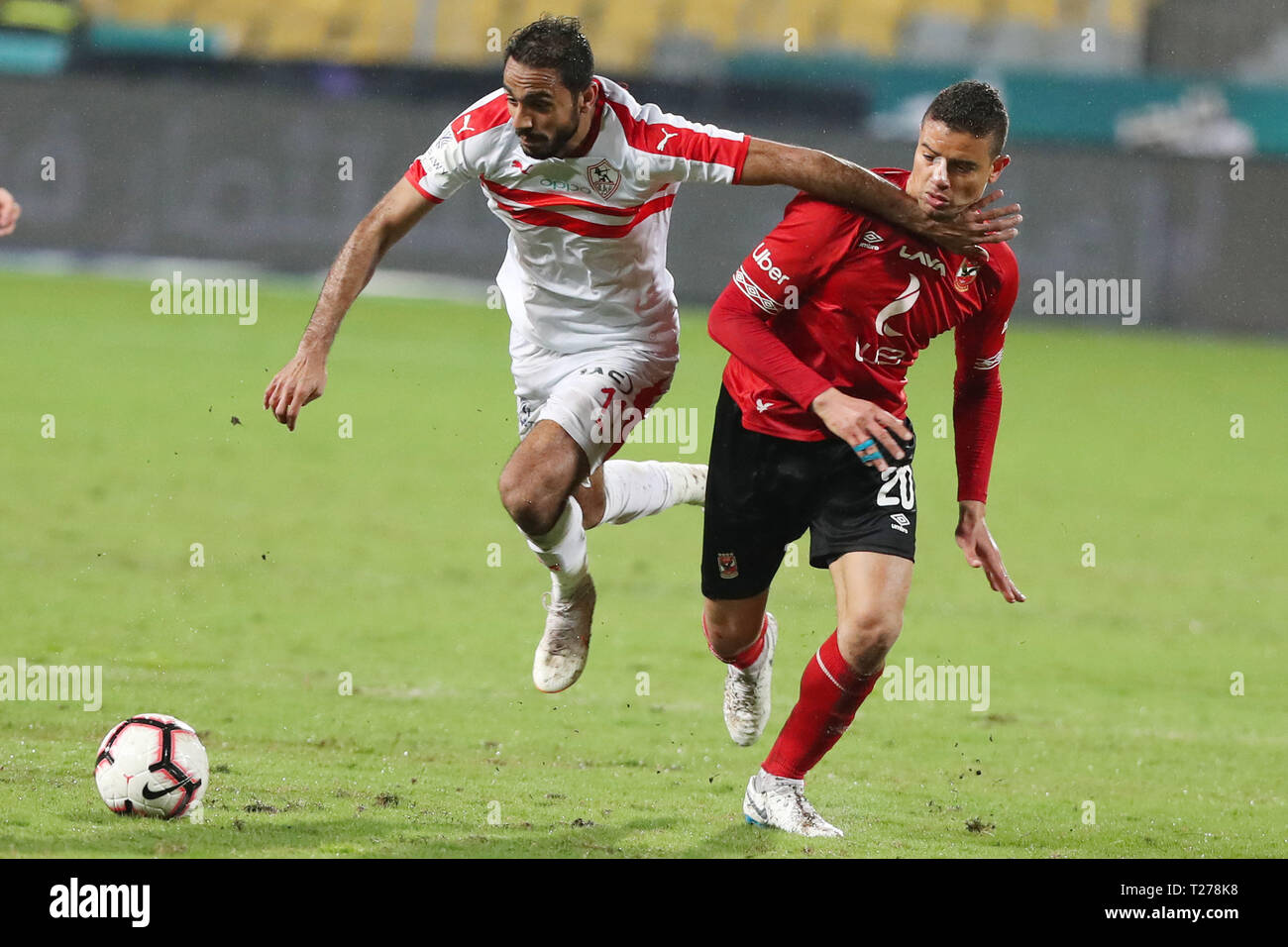 Alexandria, Egypt. 30th Mar, 2019. Saad Samir (R) of Al-Ahly competes ...