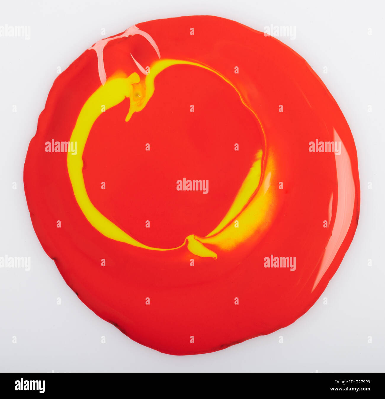 Red paint drop with yellow line isolated on white paper background ...
