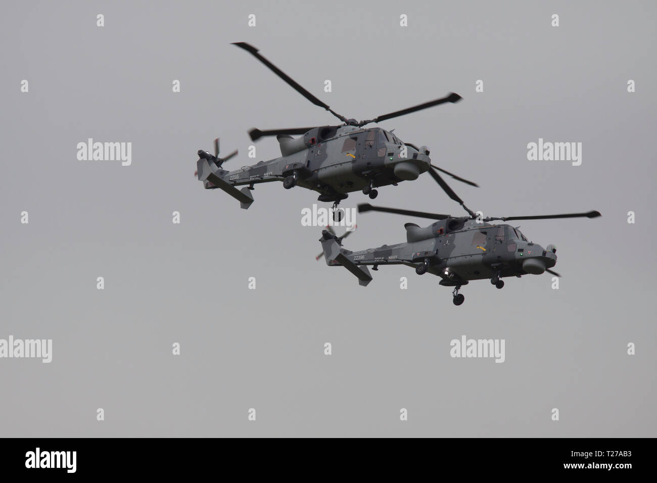 Two Royal Navy | AgustaWestland AW159 Wildcat helicopter in action ...