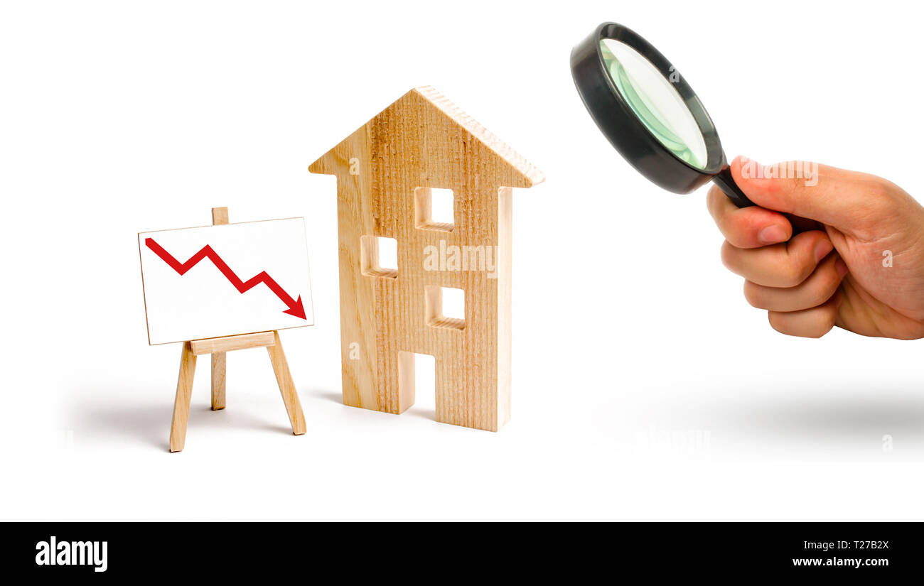 Magnifying glass is looking at the wooden house and red arrow down ...