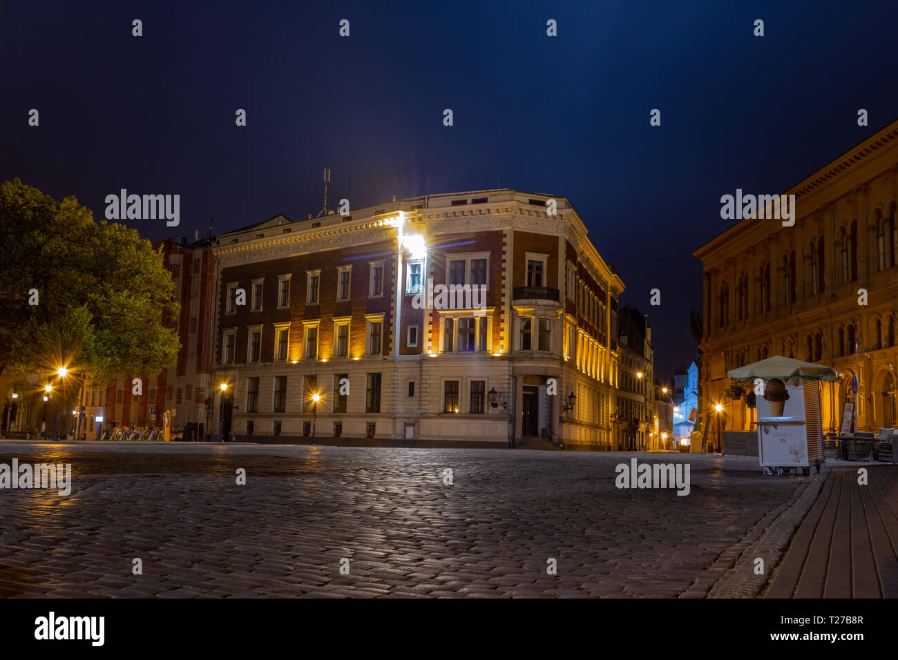 Riga Dome Square (Doma laukums) near the Dome Cathedral at night. Its ...