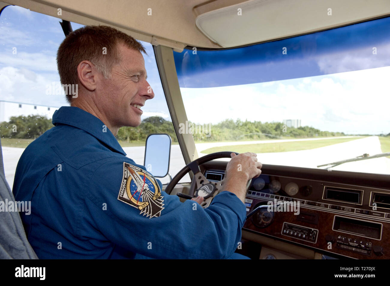 CAPE CANAVERAL, Fla. – STS-135 Commander Chris Ferguson settles in the ...