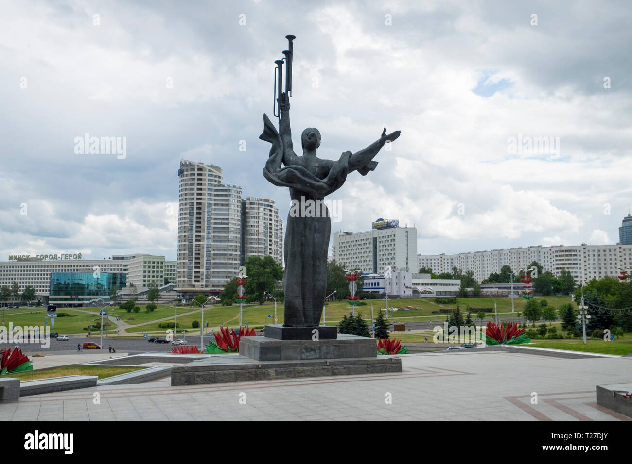Tall bronze Woman with Trumpets sculpture in front of the Great ...