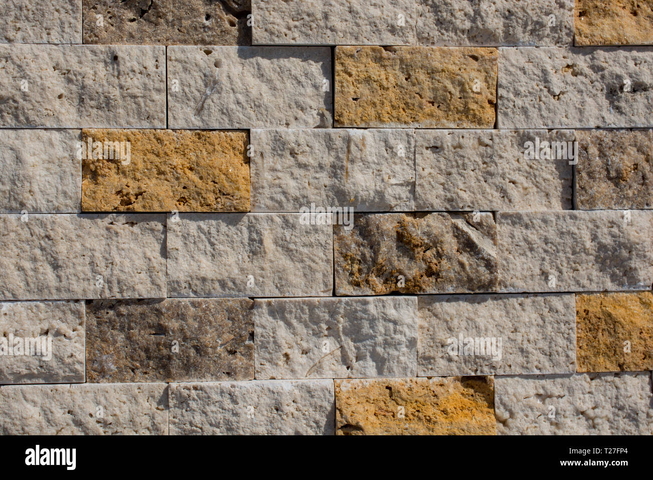 Decorative cubic stone wall as background texture Stock Photo - Alamy