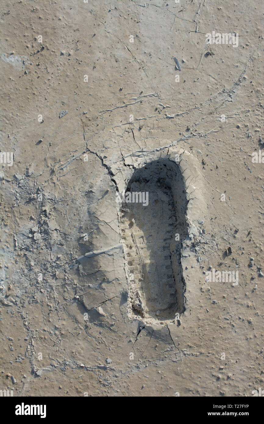 Footstep pattern seen on a concrete background Stock Photo - Alamy