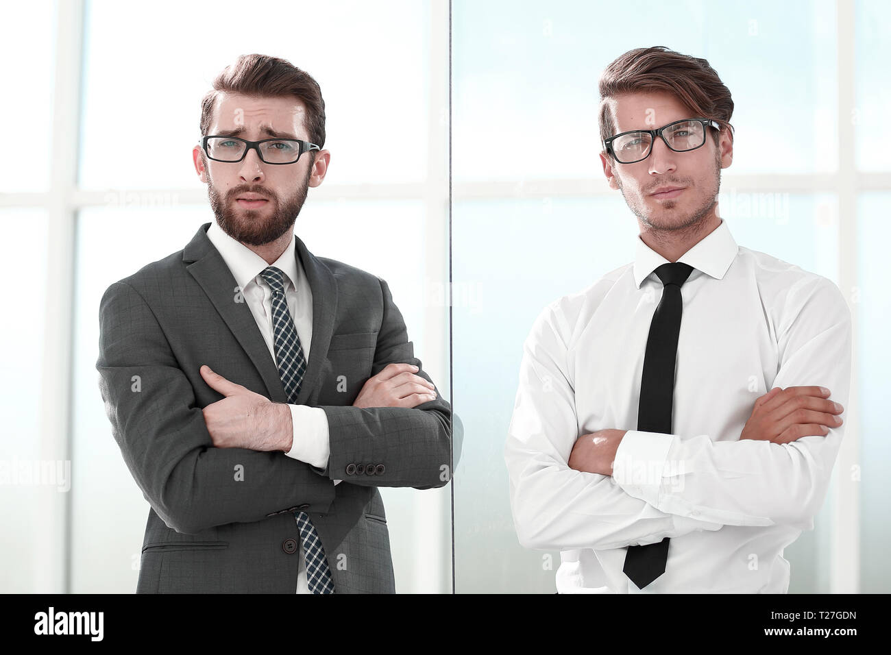 two business people standing in the office Stock Photo - Alamy
