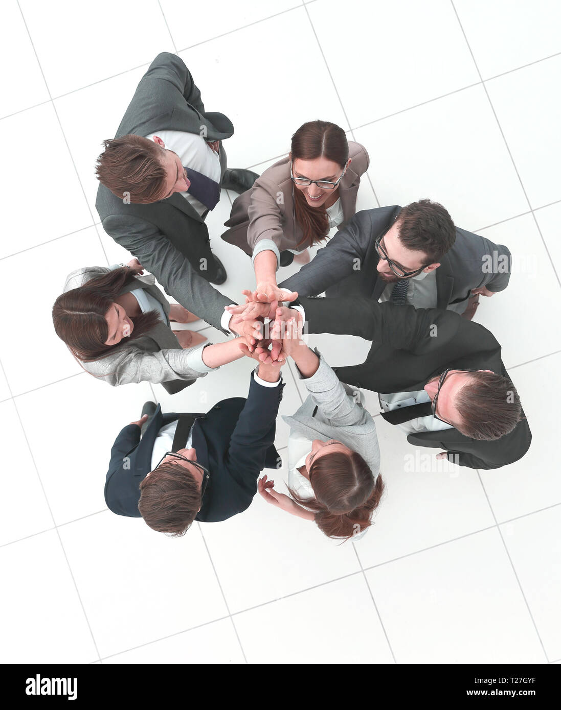 top view.business team putting their hands together Stock Photo - Alamy