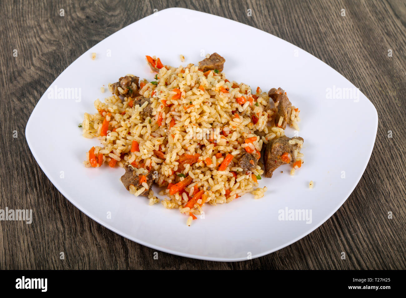 Asian rice - Plov with meat and carrot Stock Photo - Alamy