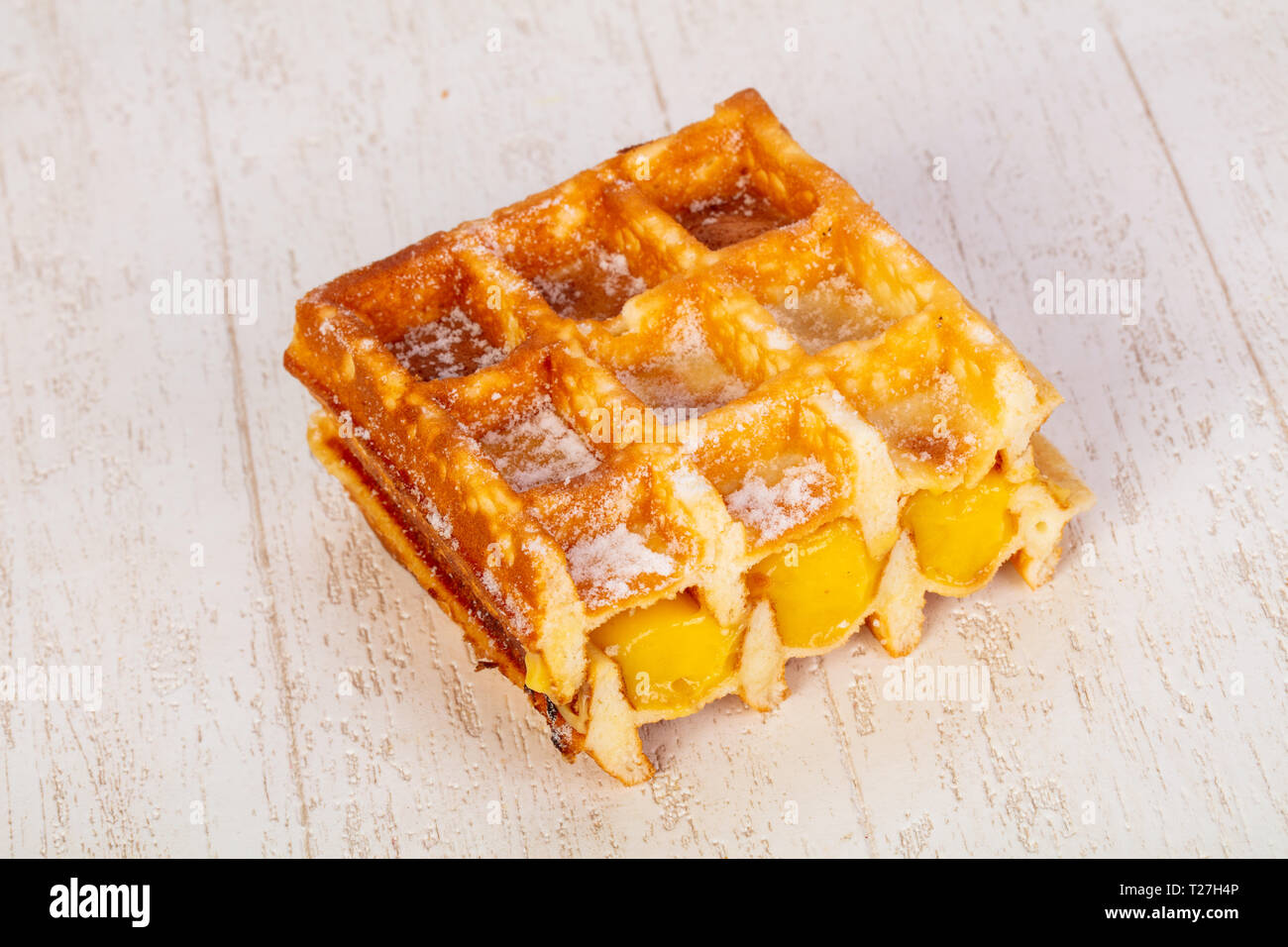 Sweet Waffle with berry jam Stock Photo - Alamy