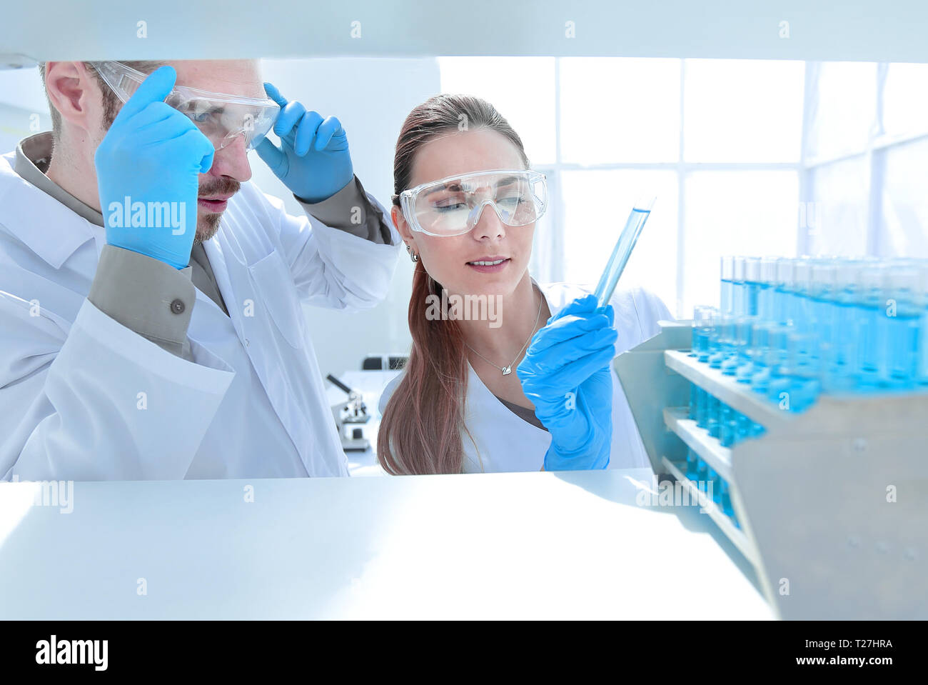 two researchers conduct laboratory studies Stock Photo - Alamy