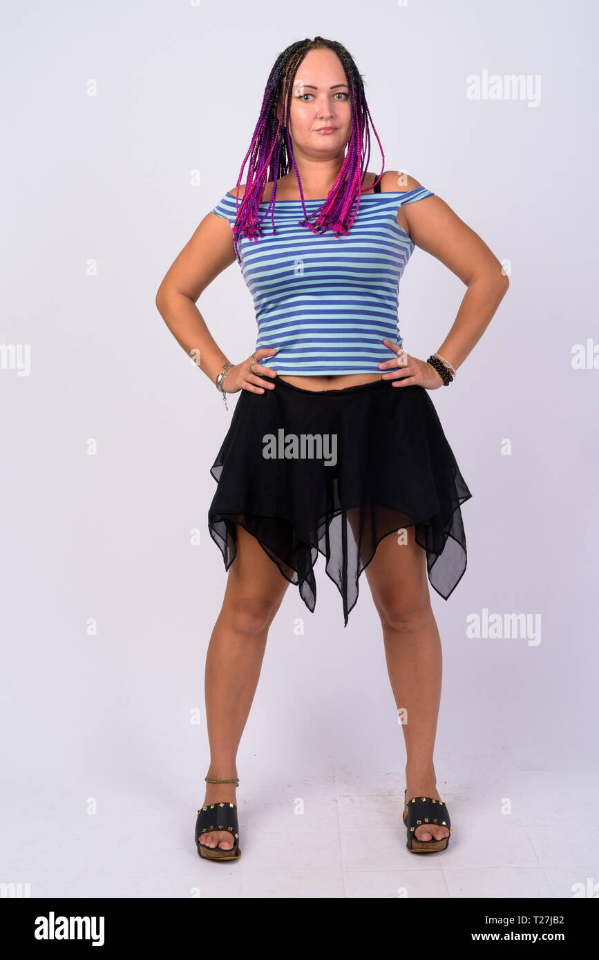 Full body shot of rebellious woman with dreadlocks Stock Photo - Alamy