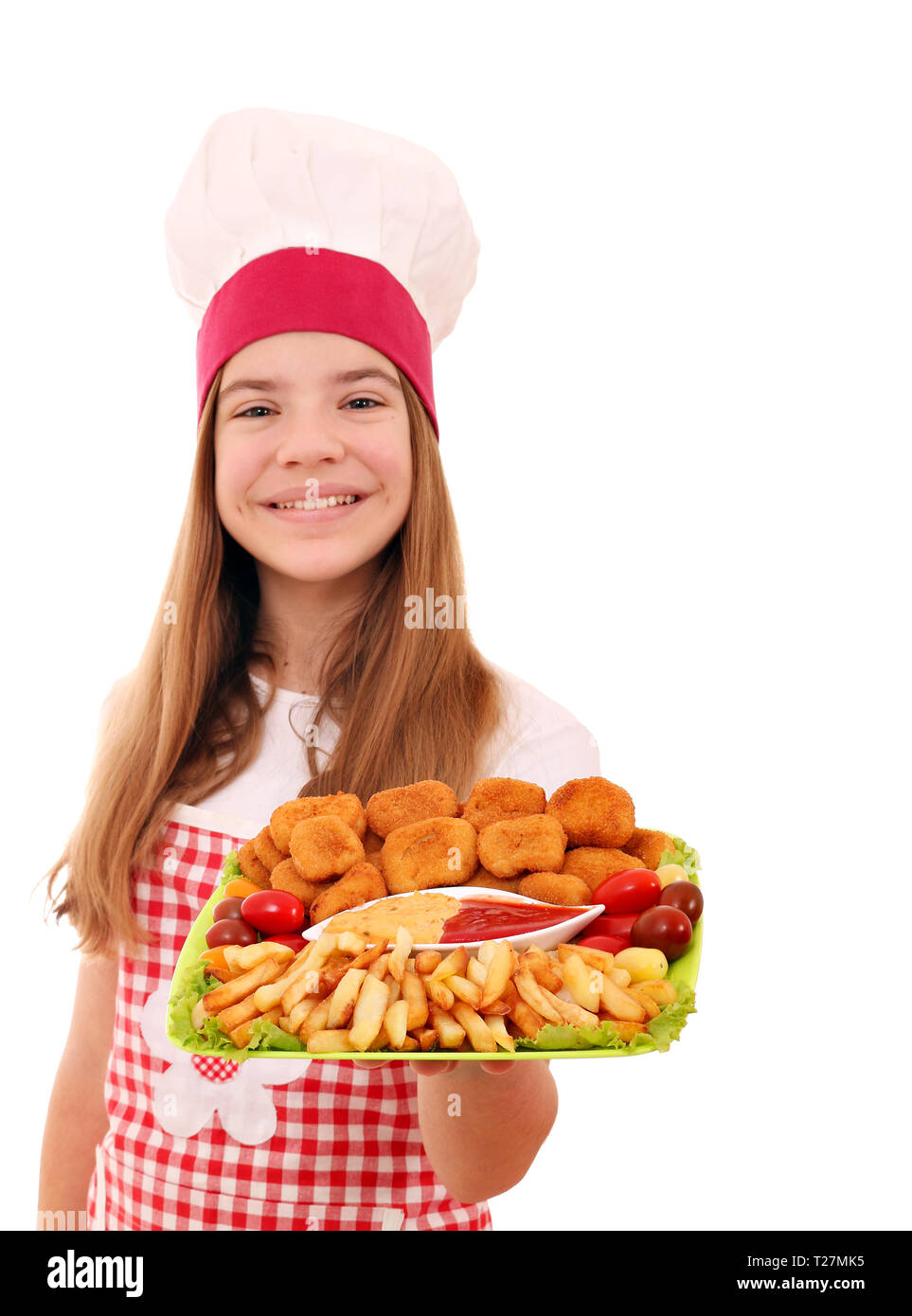 Happy girl cook with chicken nuggets and french fries Stock Photo - Alamy