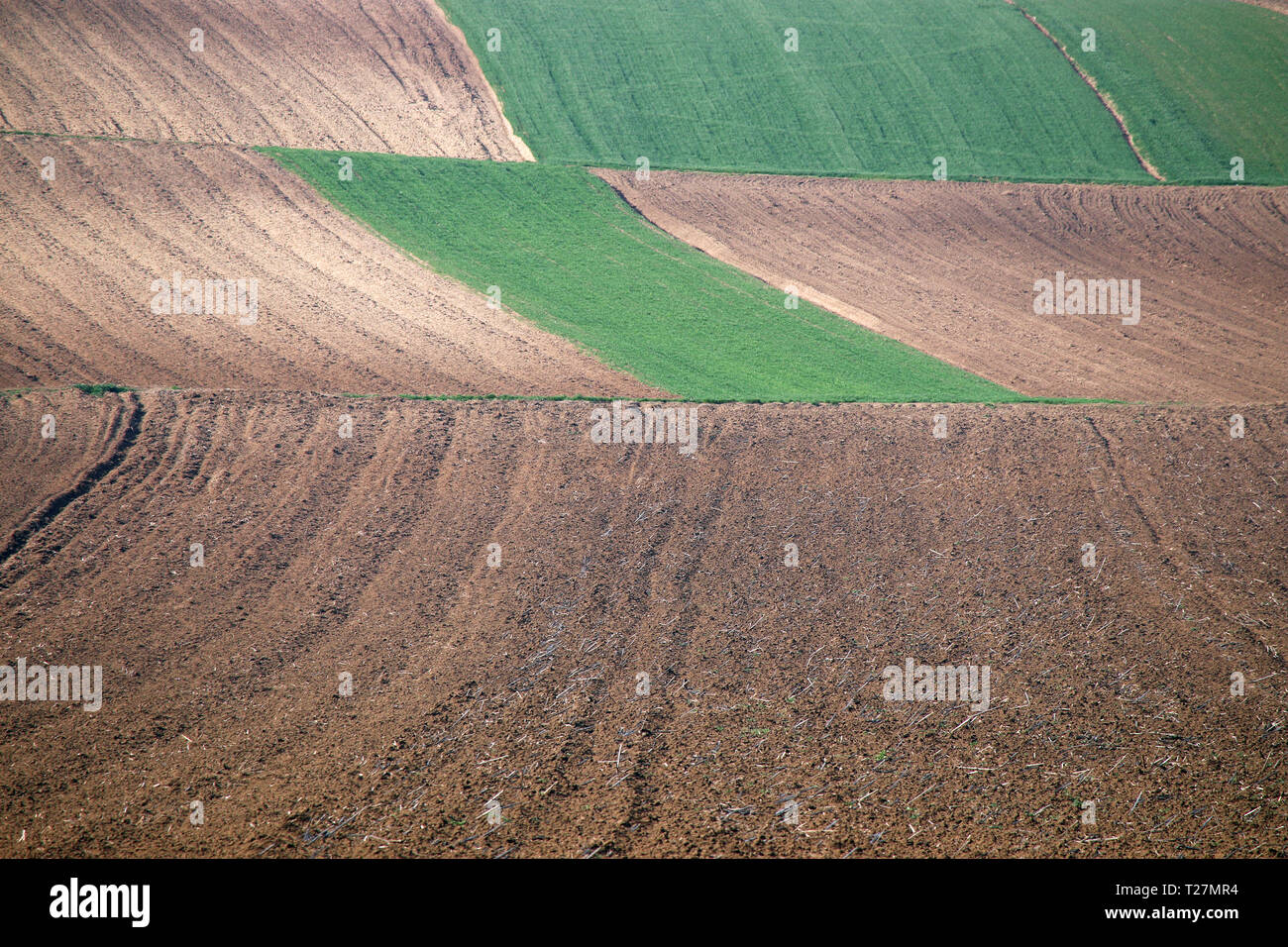 plowed field in spring farmland agriculture Stock Photo - Alamy