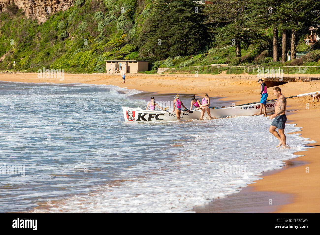 Traditional timber surf boat with female womens rowing team,Newport ...