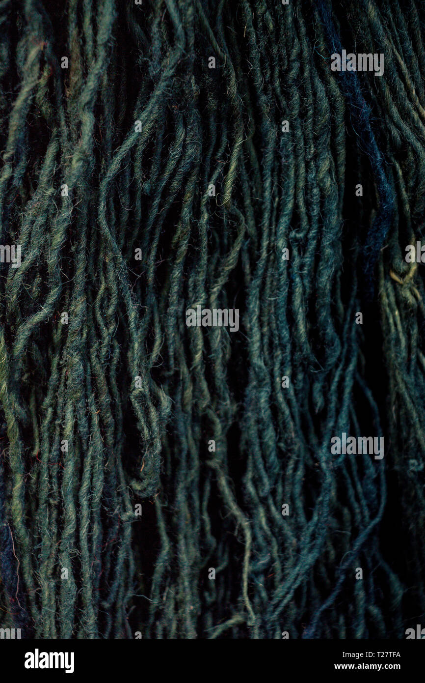 Natural wool thread dyed in color for carpet making Stock Photo - Alamy