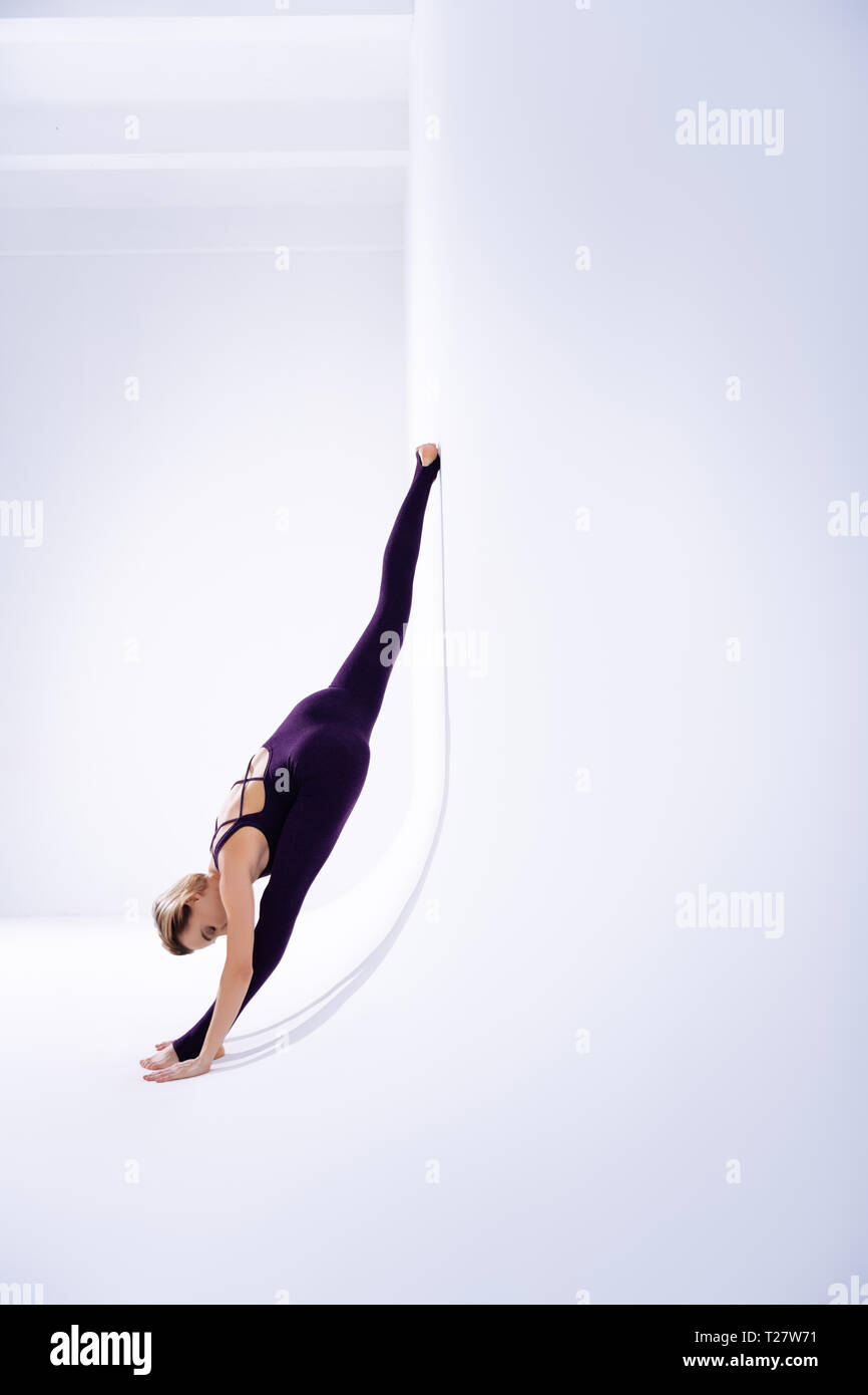 Serious good looking woman focusing on her activity Stock Photo - Alamy