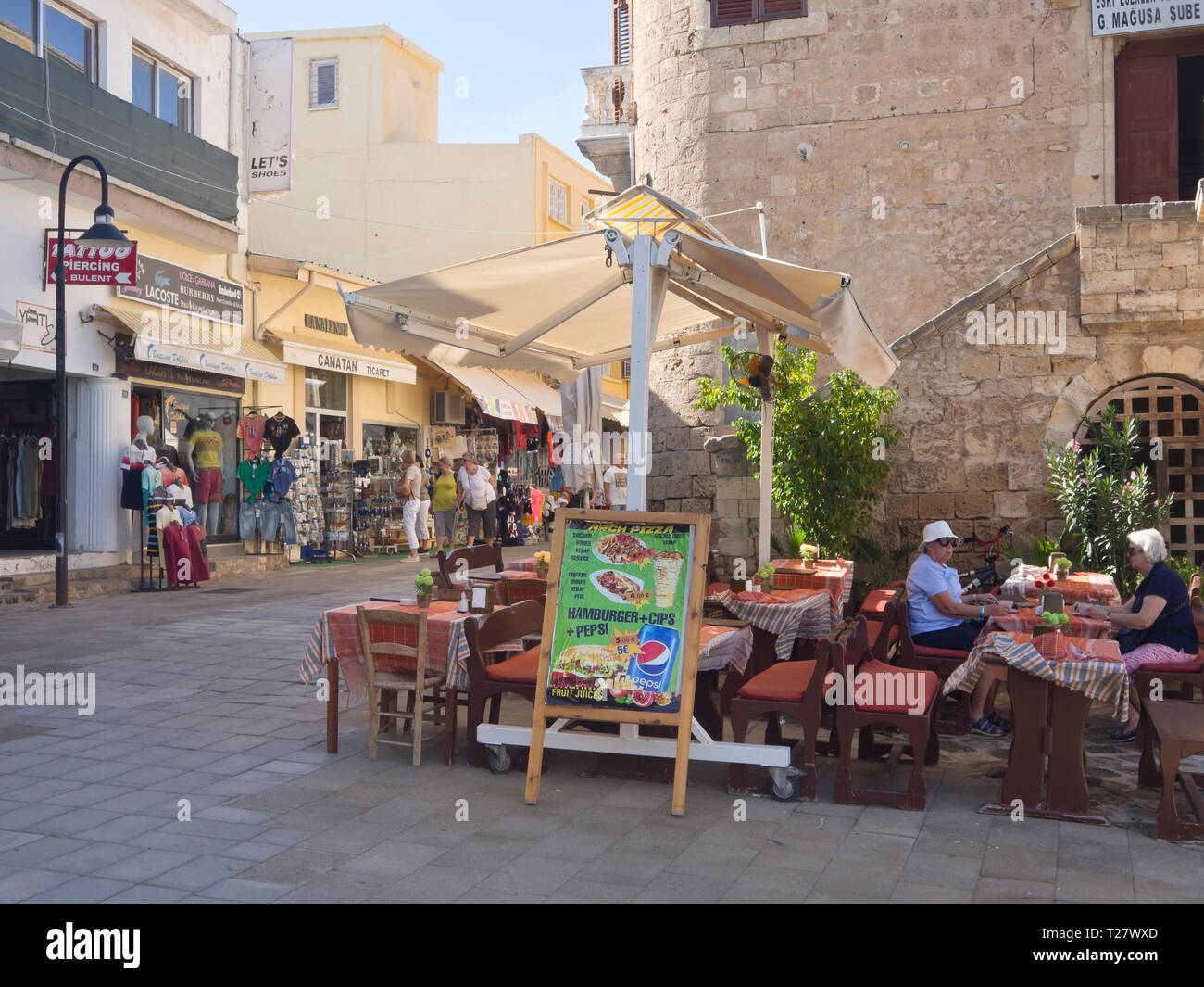 Street corner with open air restaurant in the old city centre in ...