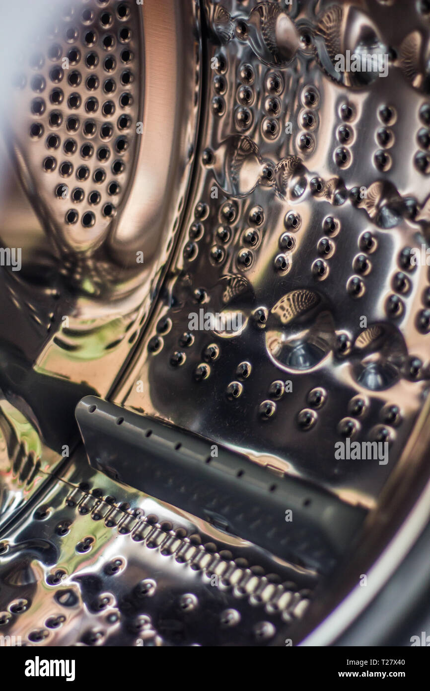 Washing machine drum. Washer. Washing things Stock Photo - Alamy