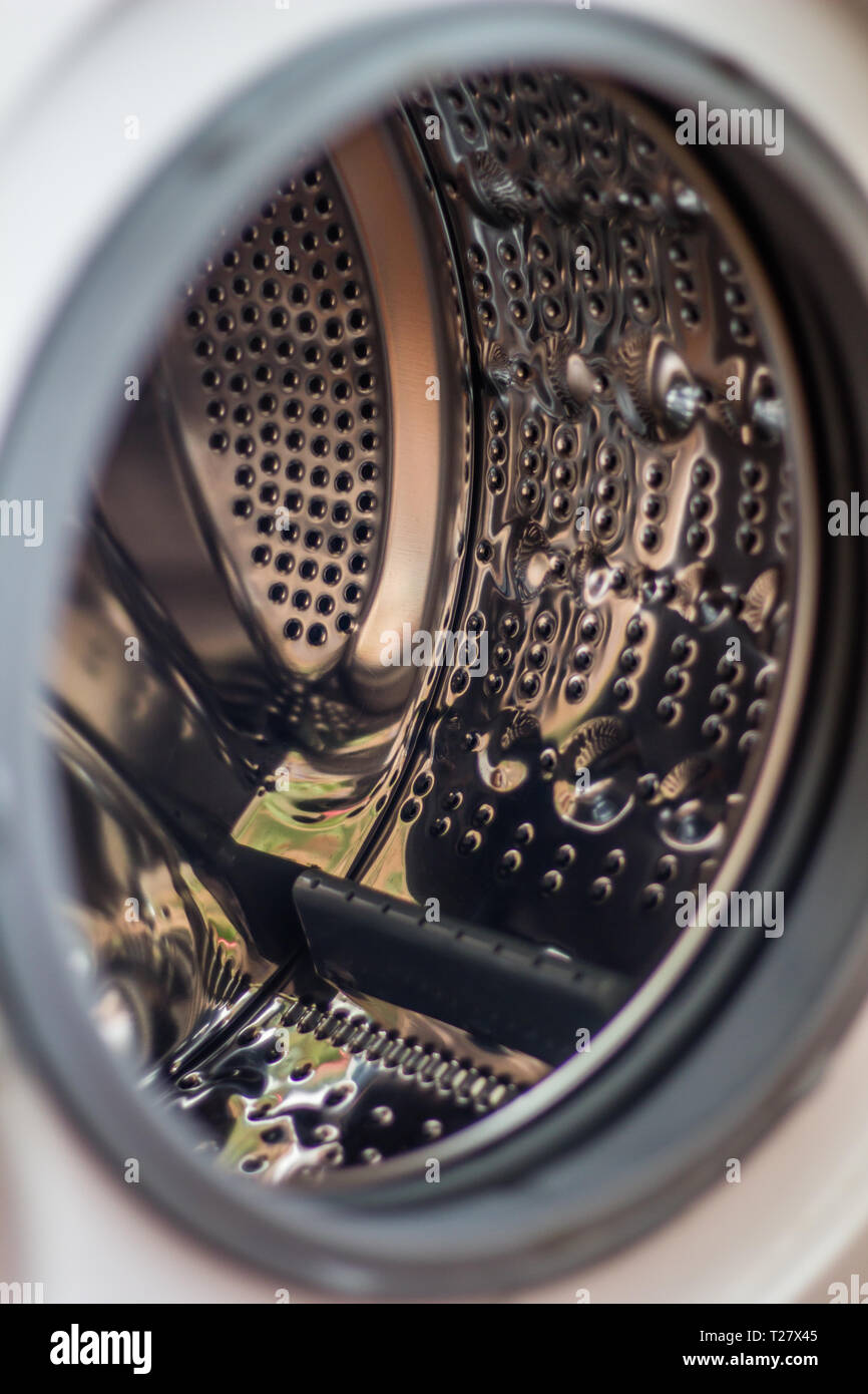 Washing machine drum. Washer. Washing things Stock Photo - Alamy