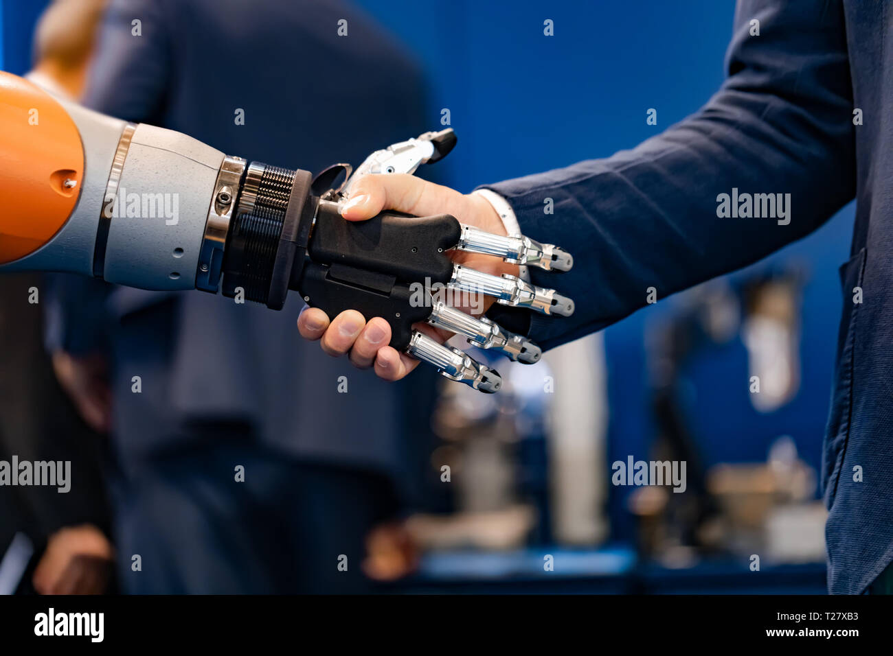 Robot And Man Shake Hands High Resolution Stock Photography and Images ...