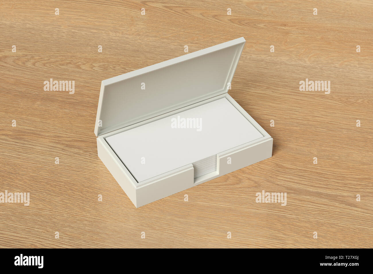 White leather business card box holder with blank business cards in ...