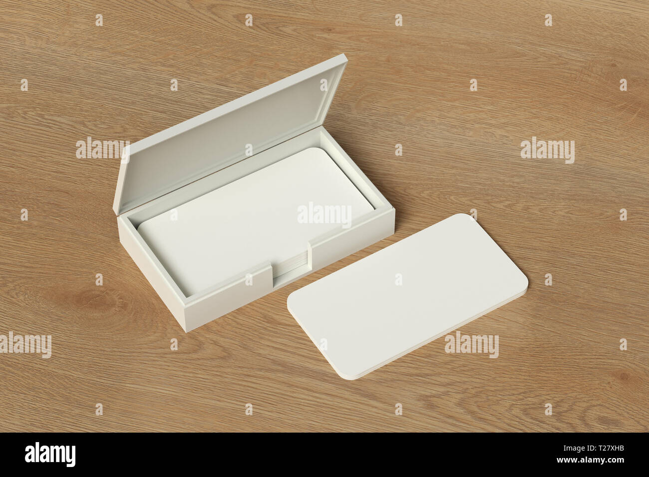 White leather business card box holder with blank business cards with ...