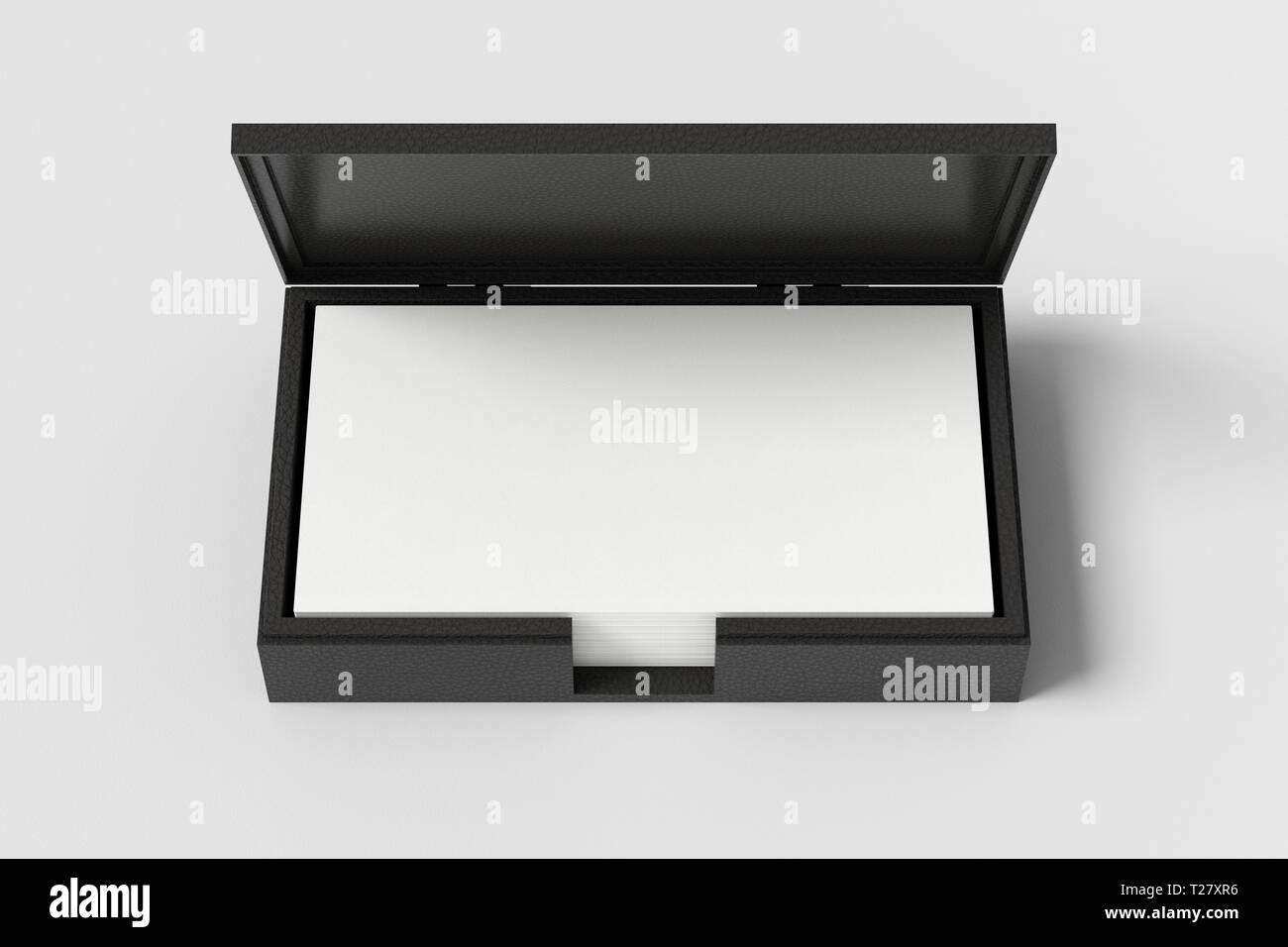 Black leather business card box holder with blank business cards in ...
