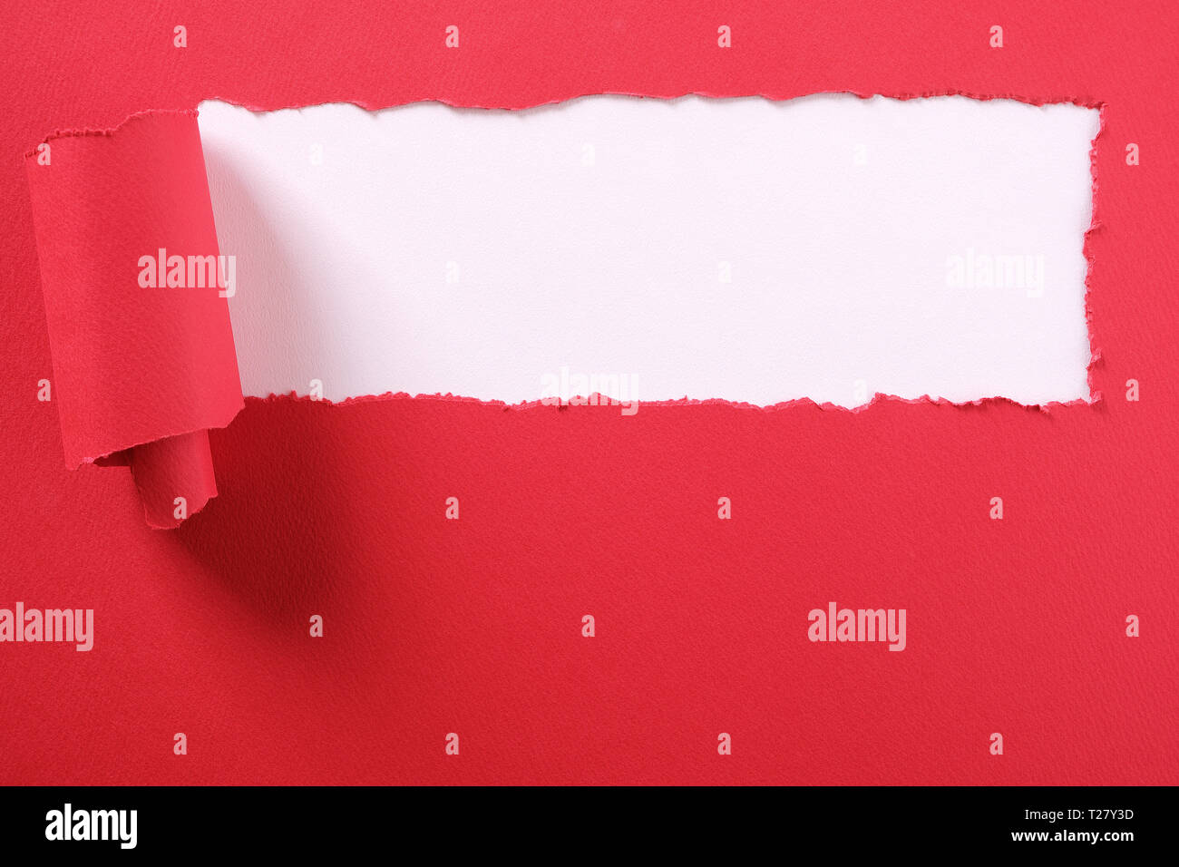 Torn red paper strip banner white background Stock Photo - Alamy