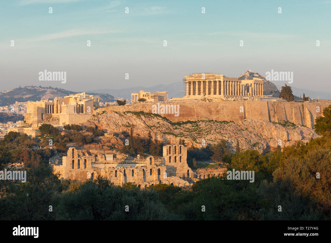 The Acropolis of Athens, Greece, with the Parthenon Temple. View from Filopappou Hill on sunset ...