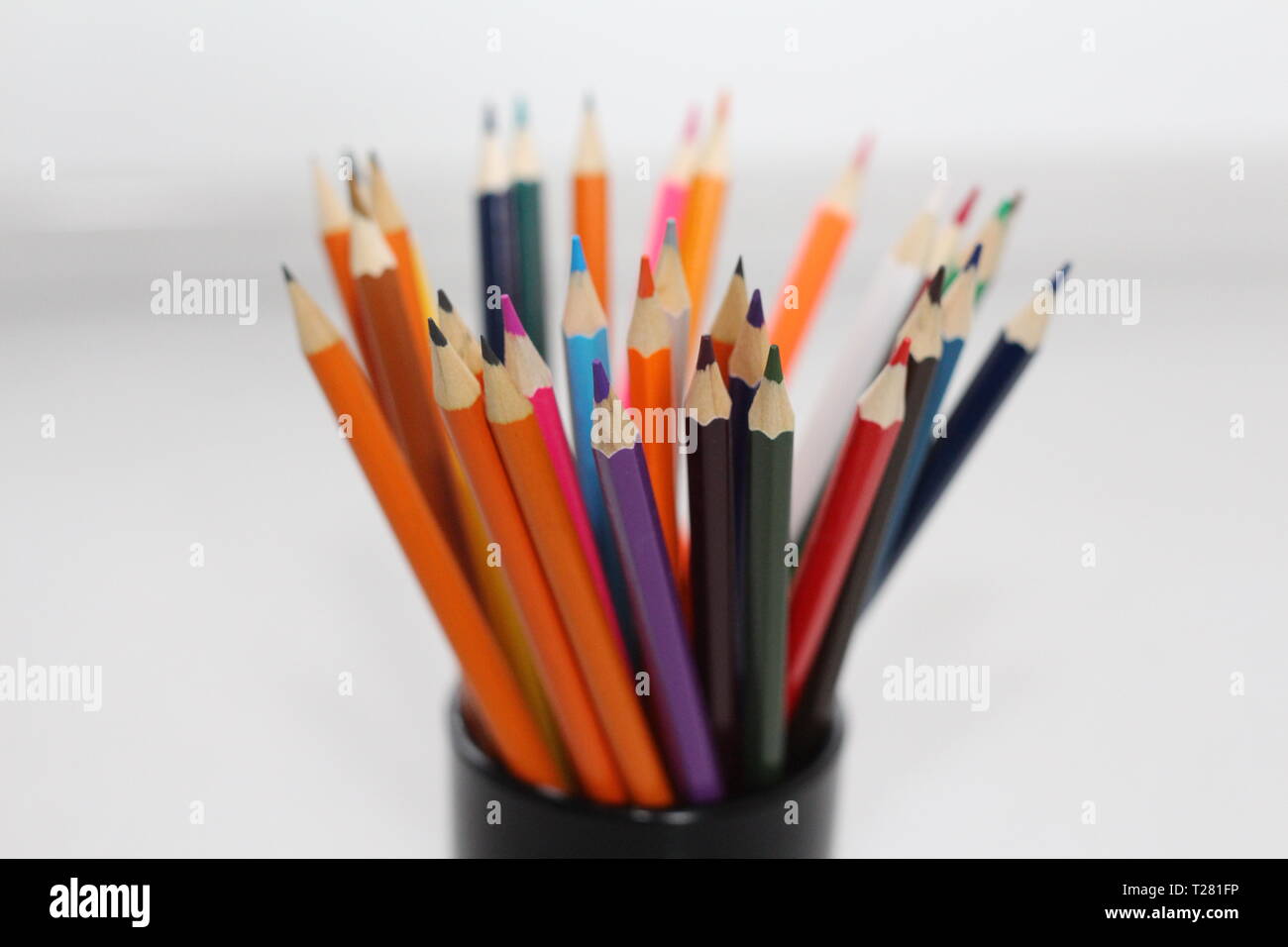 Color pencils for schoolchildren and students. Pencils are scattered on ...