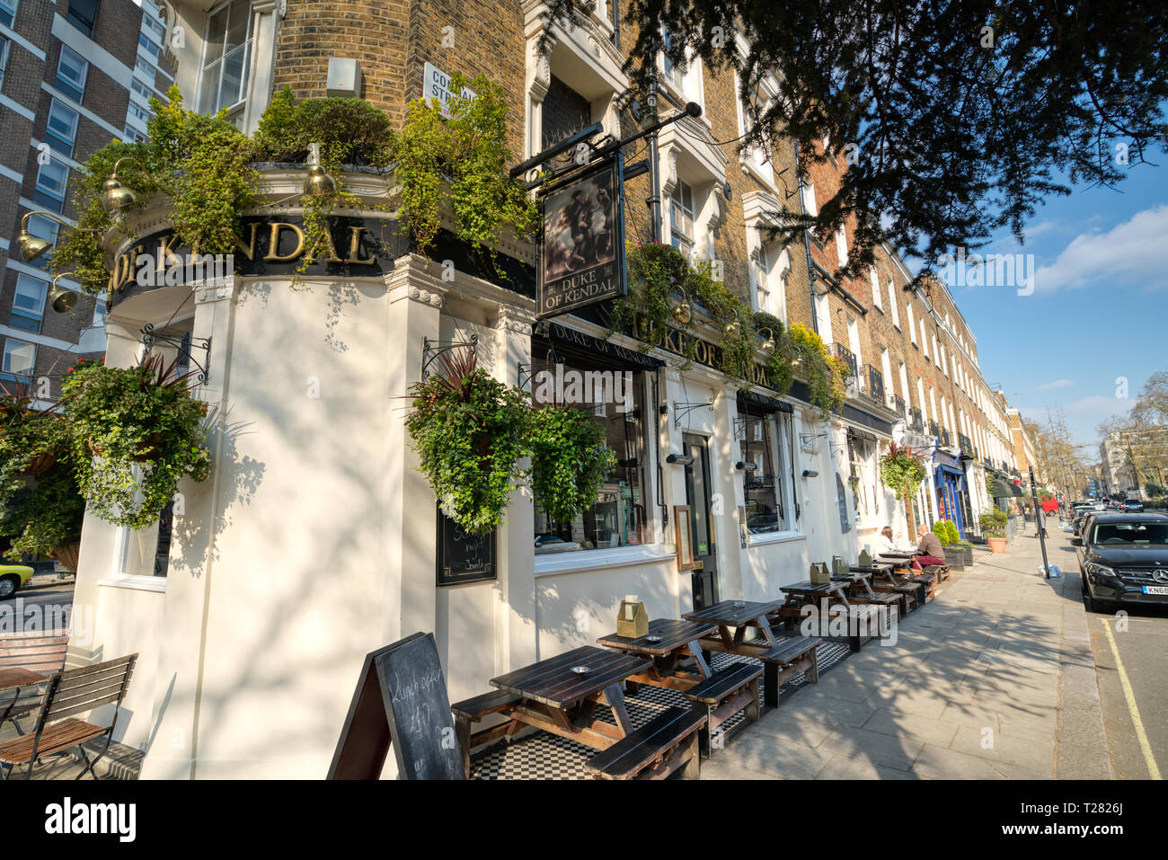 Connaught Village - Hyde Park Estate's luxury retail quarter on a sunny ...