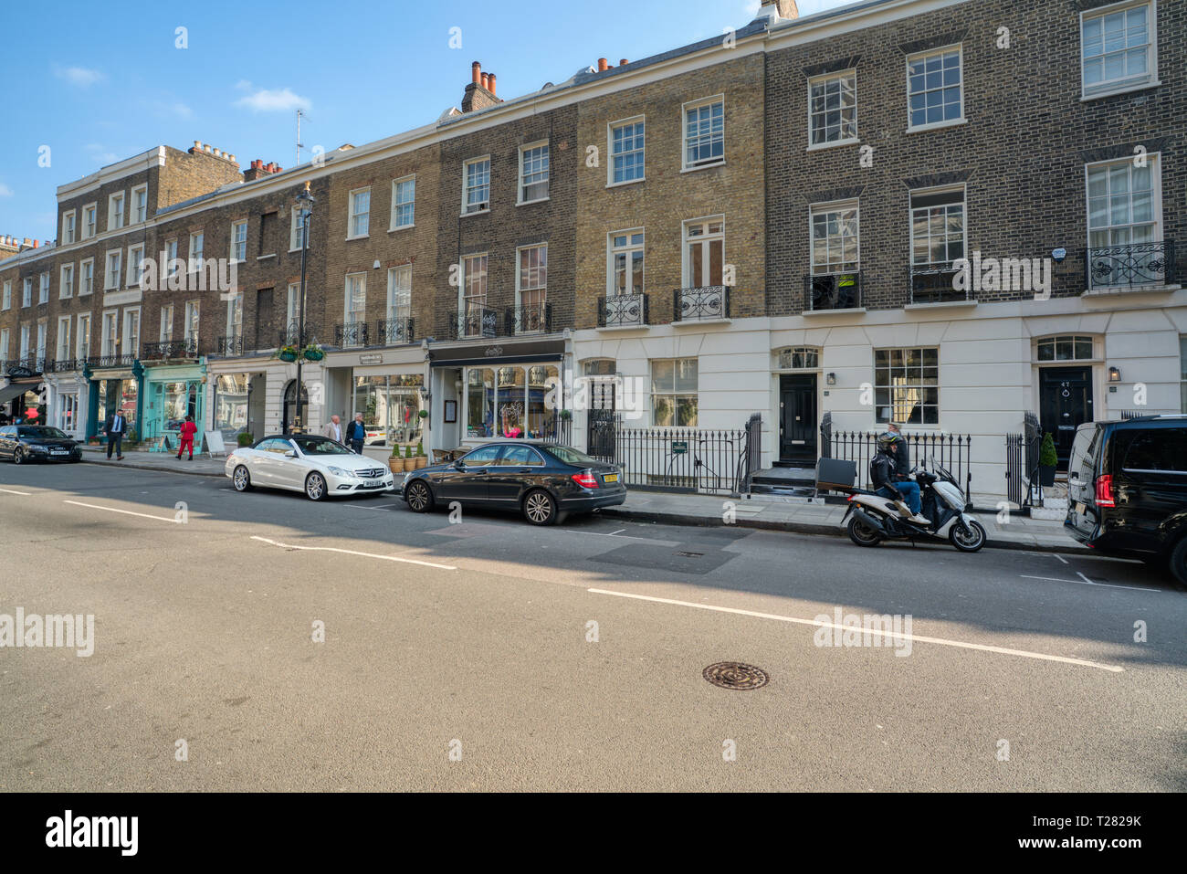 Connaught Village - Hyde Park Estate's luxury retail quarter on a sunny ...