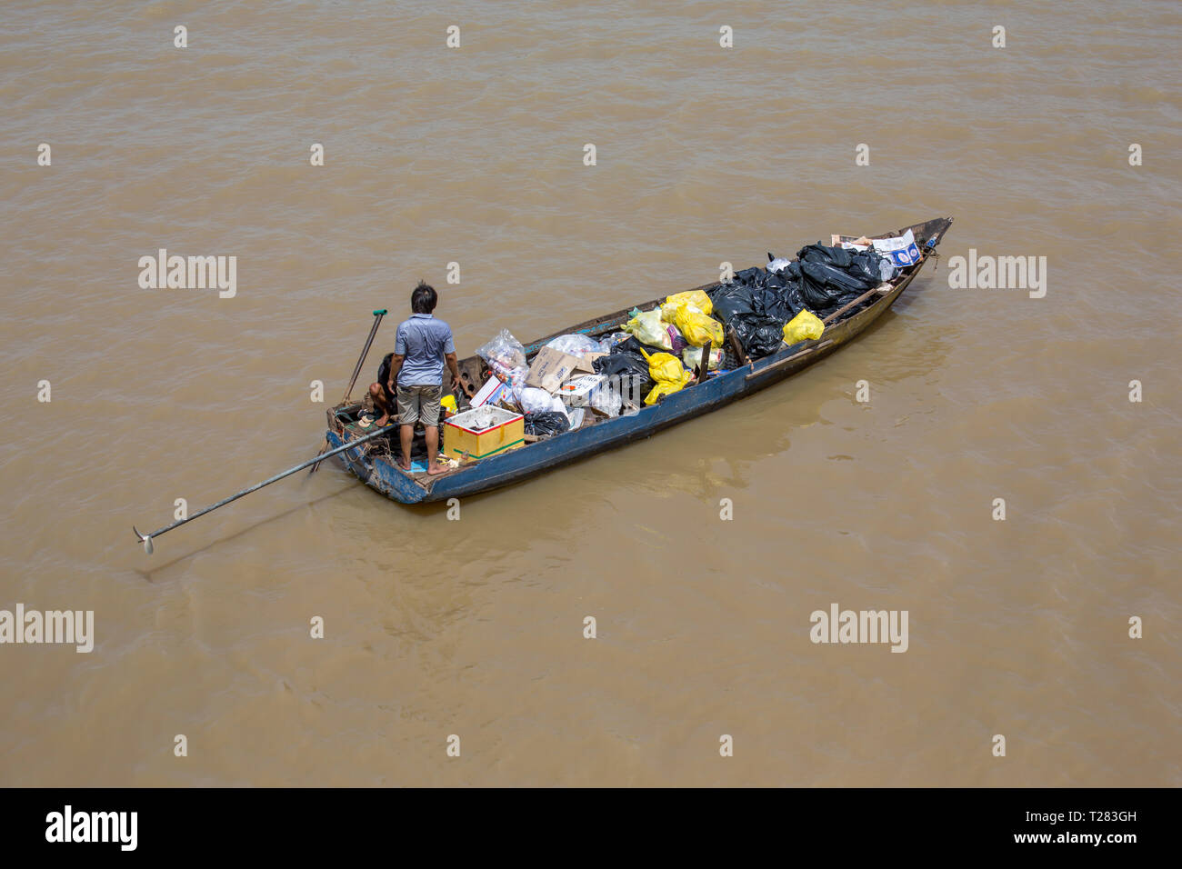 Garbage boat hi-res stock photography and images - Alamy