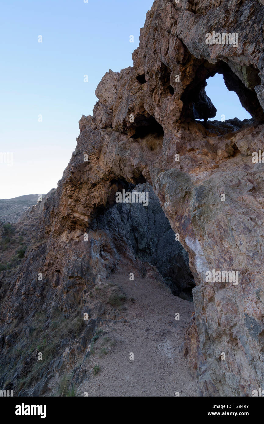 Natural rock formation with shape of door Stock Photo - Alamy