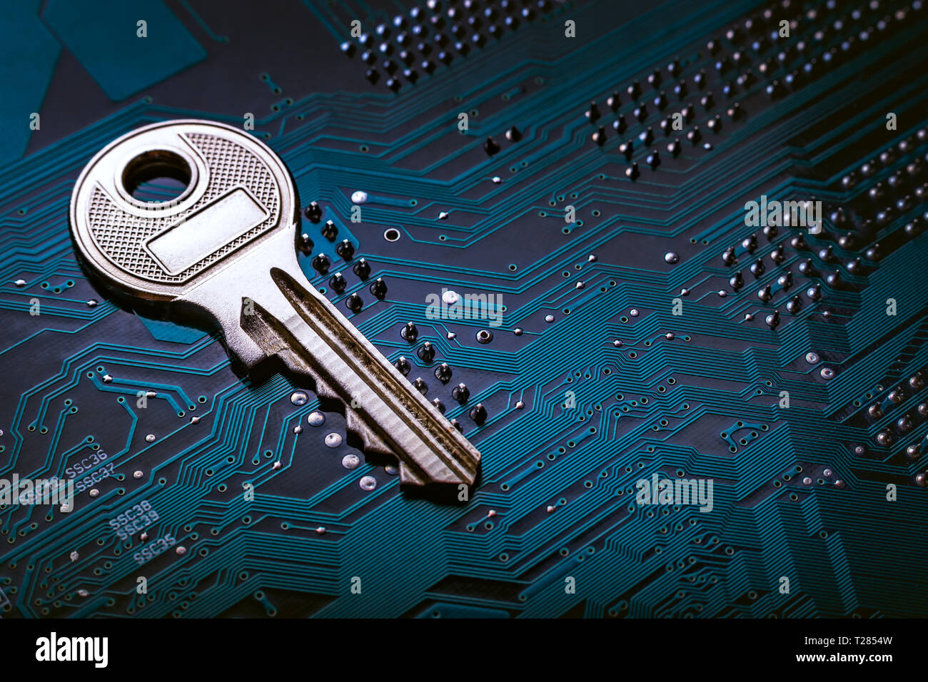 Background image of key on a microchip Stock Photo - Alamy